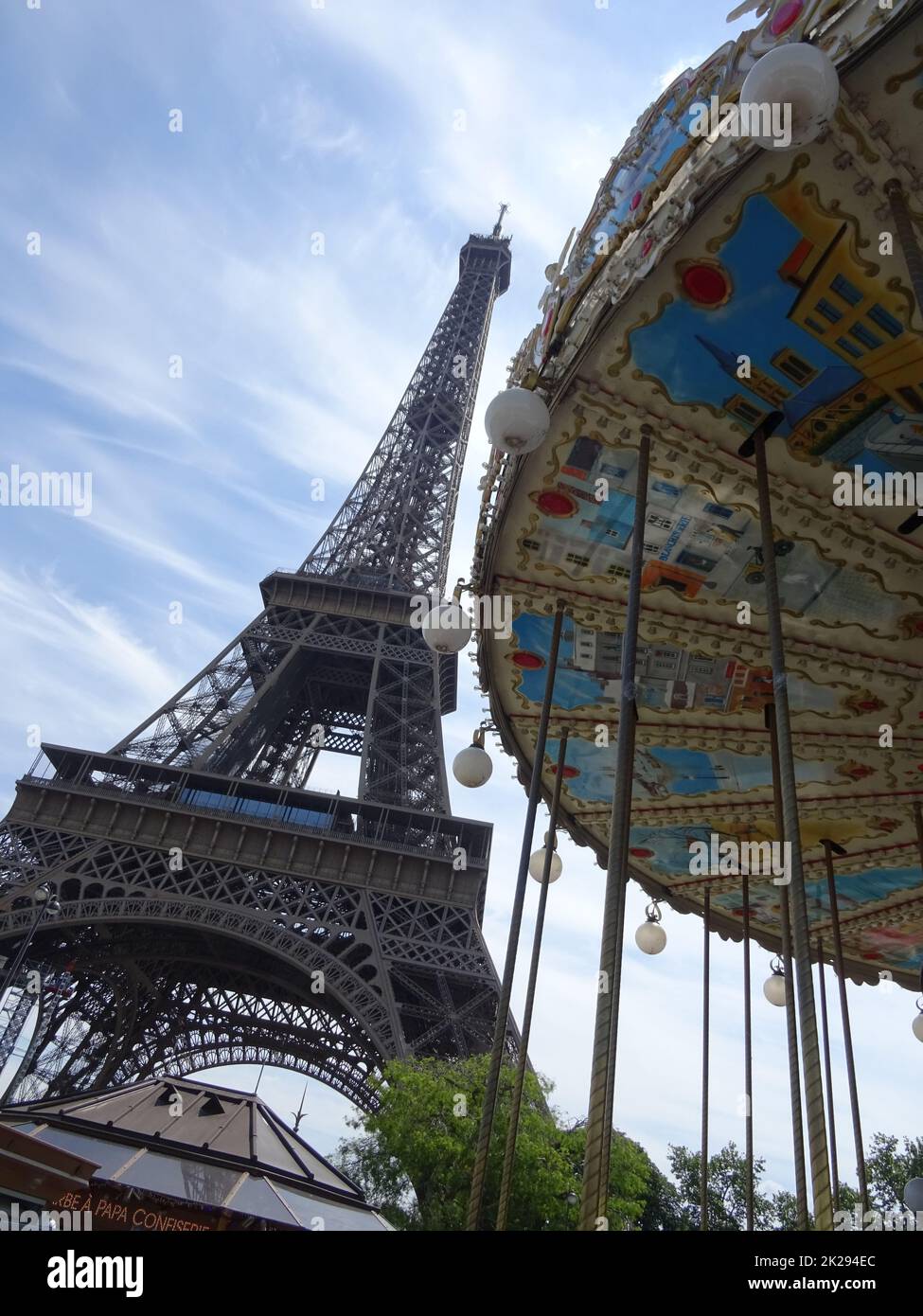 Paris in France with eiffel tower and typical carousel Stock Photo - Alamy