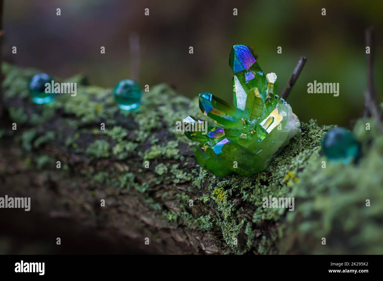 Green magical crystals in the forest Stock Photo - Alamy