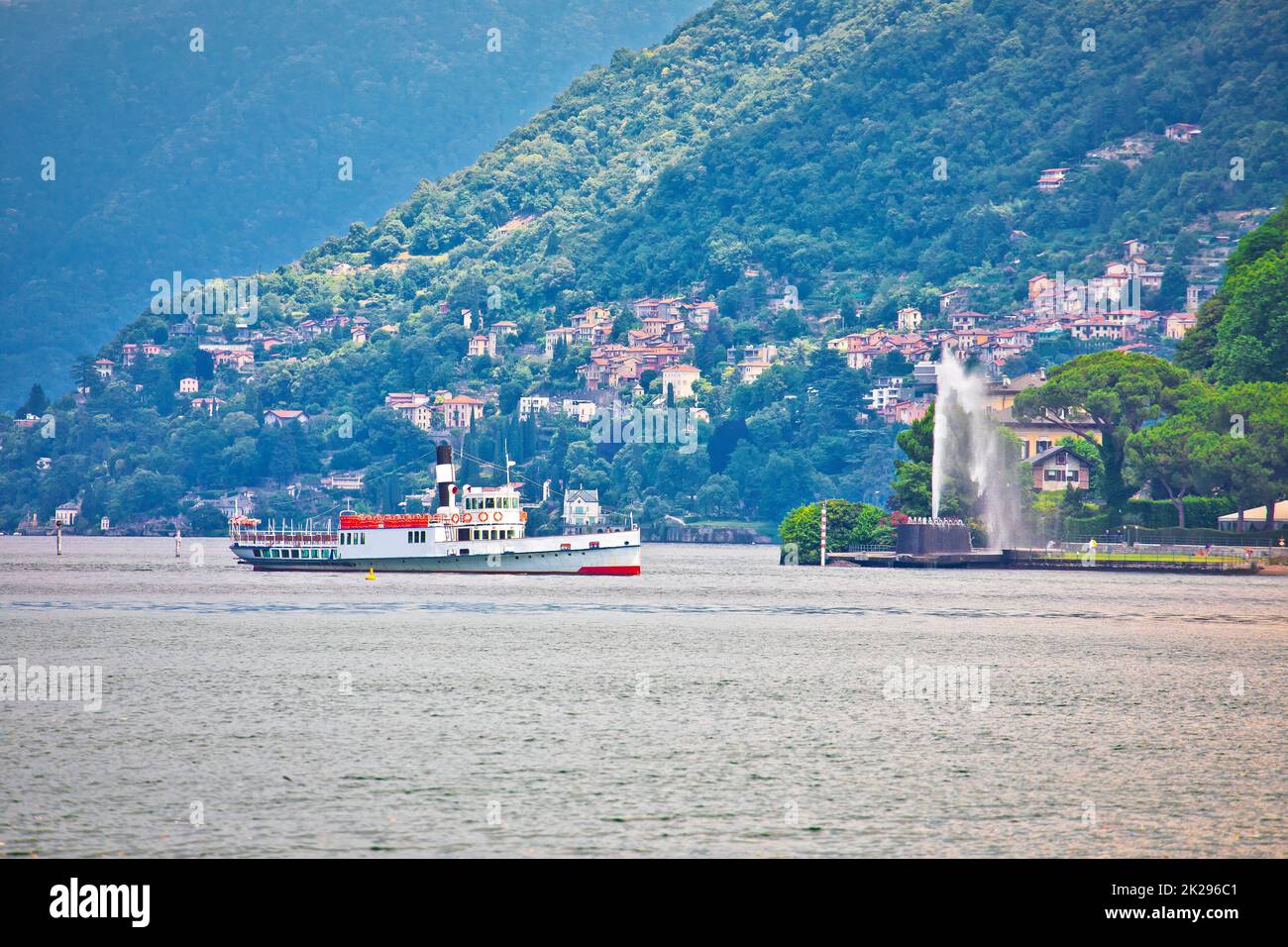 Ferry boat on Como lake near town of Como view Stock Photo - Alamy