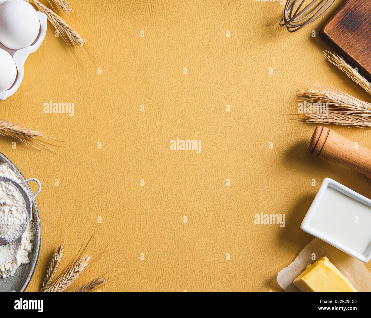 Frame of food ingredients for baking on a yellow background. Cooking ...