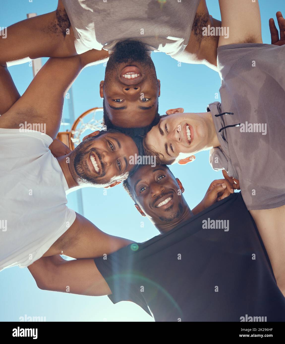 Teamwork, diversity and basketball player huddle from bottom, together ...