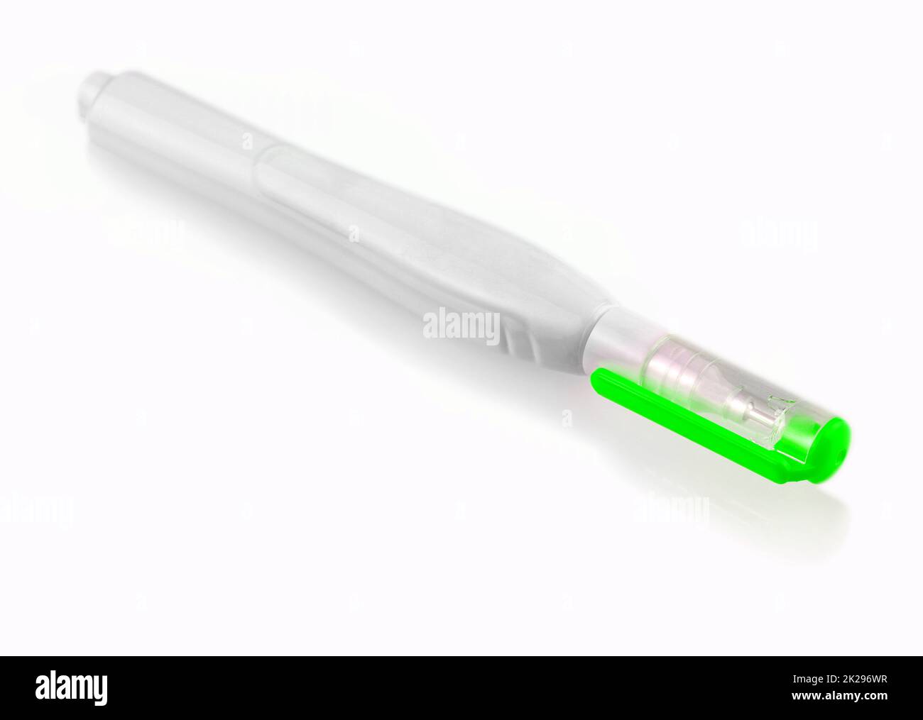 green pen corrector isolated on a white background Stock Photo - Alamy