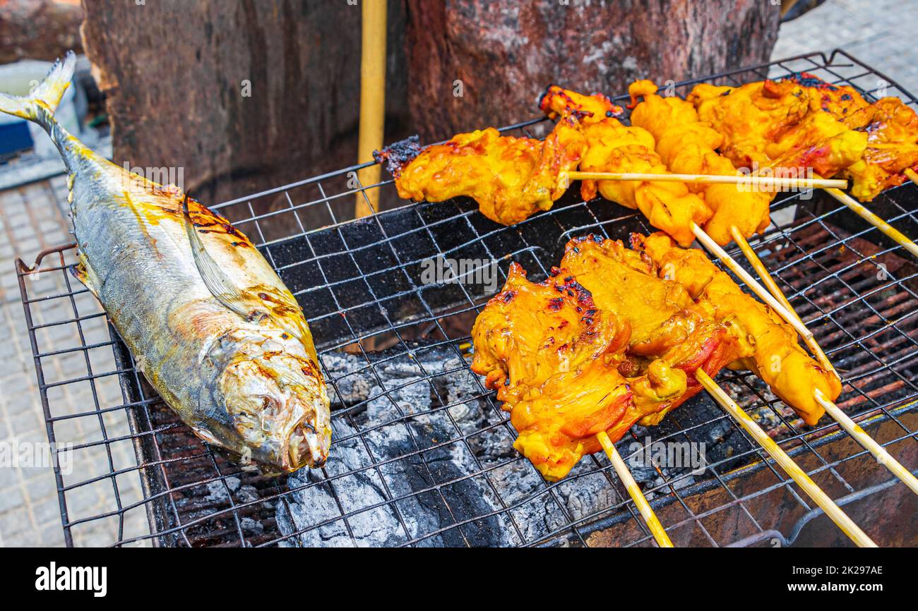 Thai food grilled chicken and fish Naithon Beach Phuket Thailand Stock ...