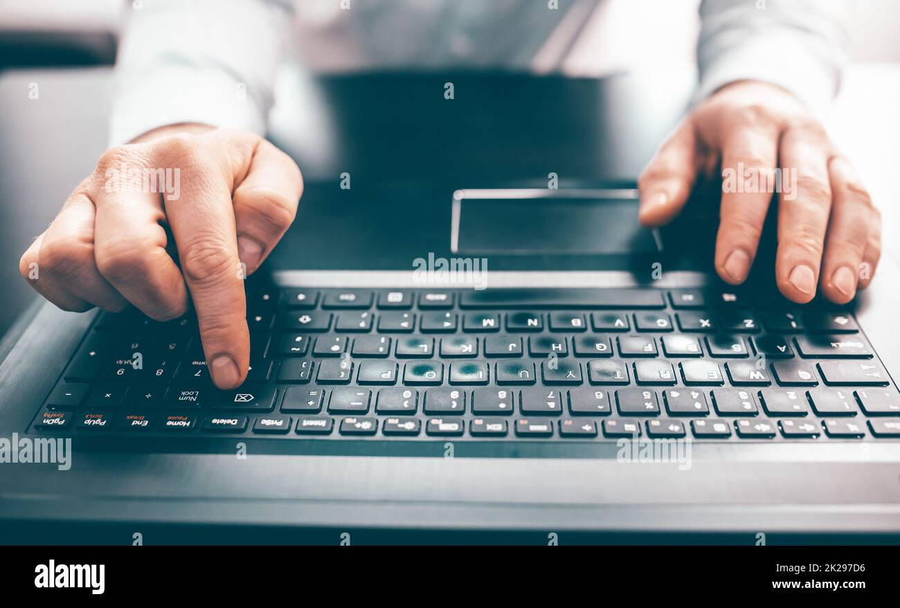 Working on laptop. Concept of using technology in communication Stock ...