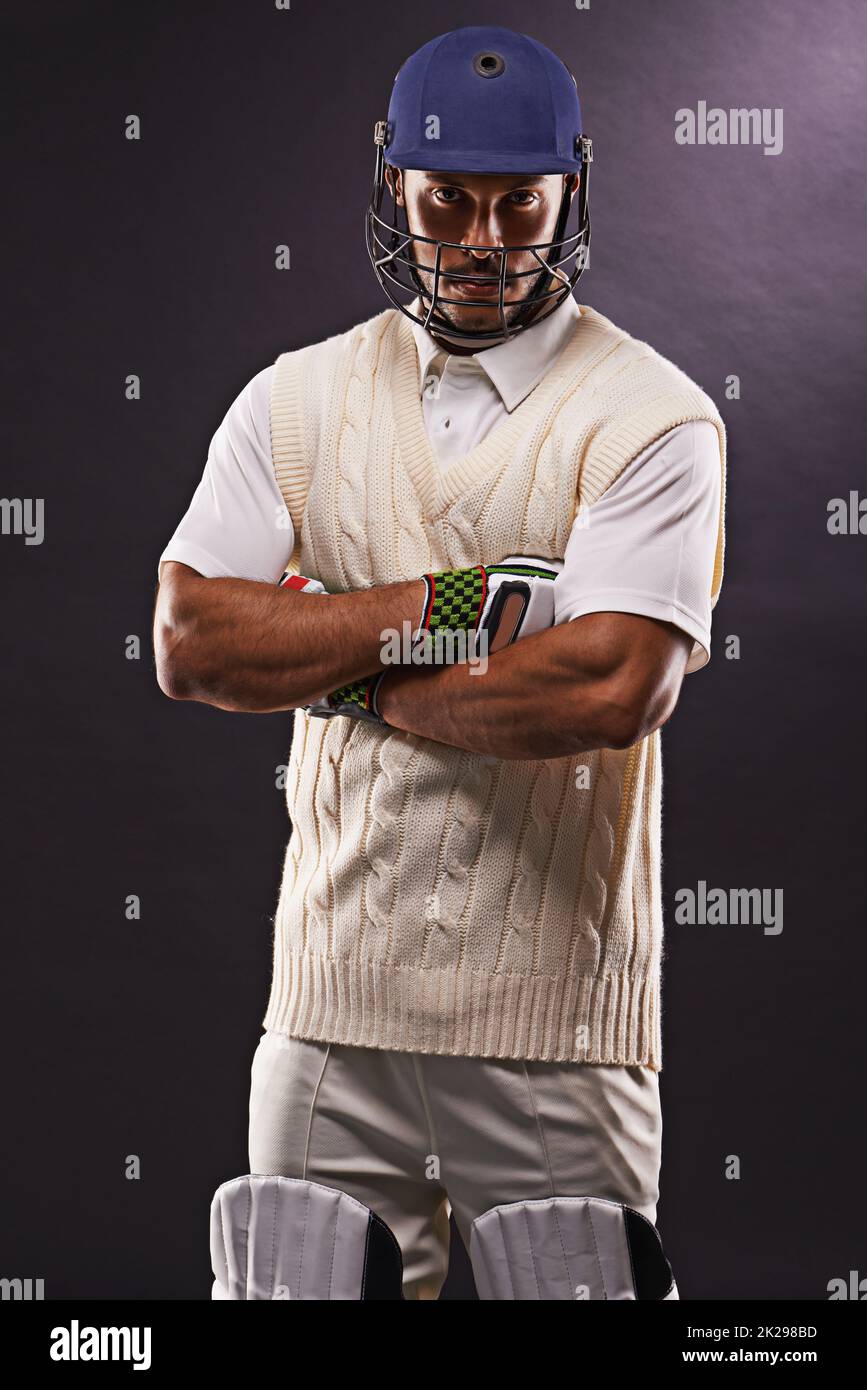 Lets hit the pitch. A cropped shot of an ethnic young man in cricket ...