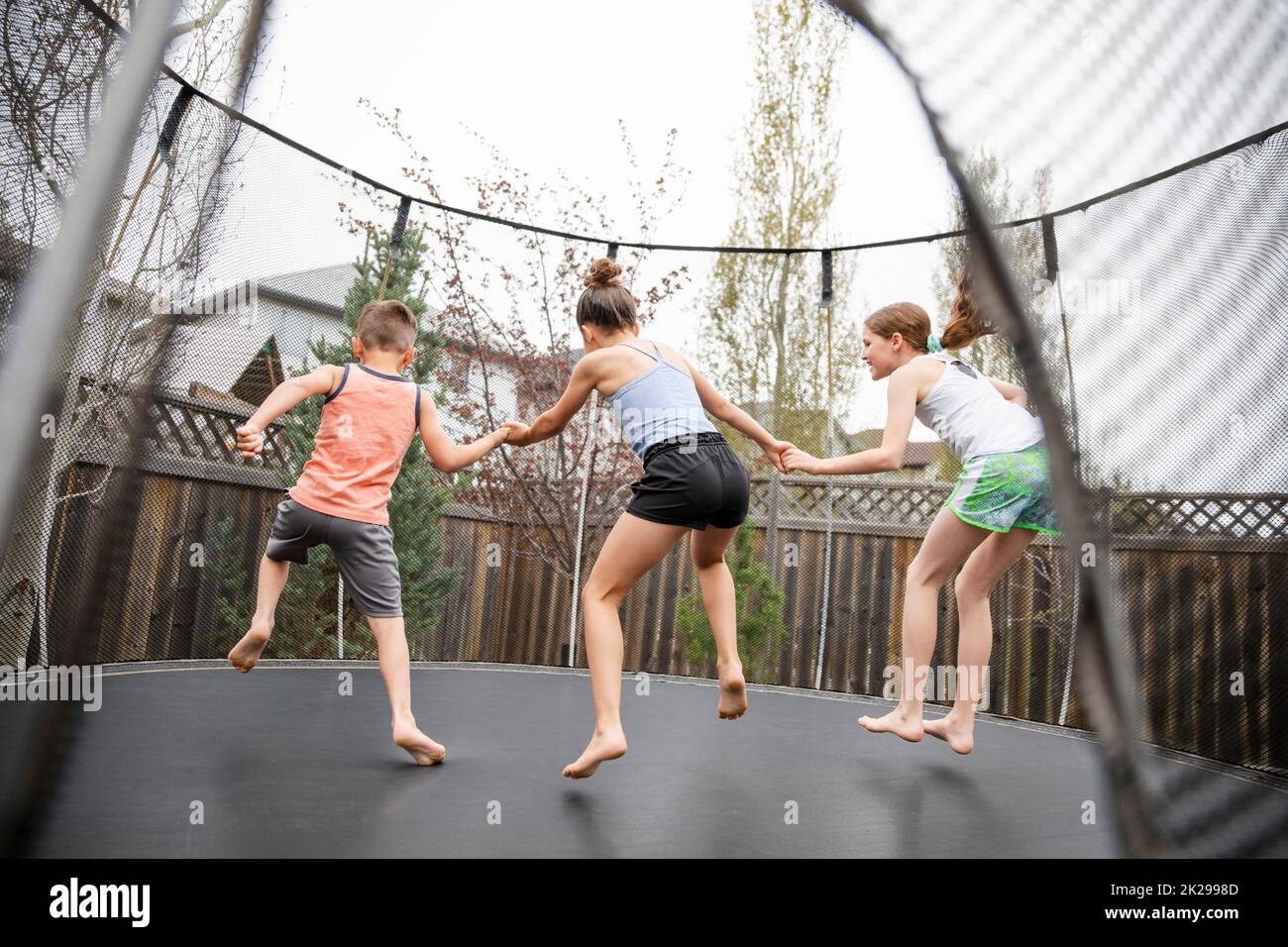 Boy preteen trampoline hi-res stock photography and images - Alamy