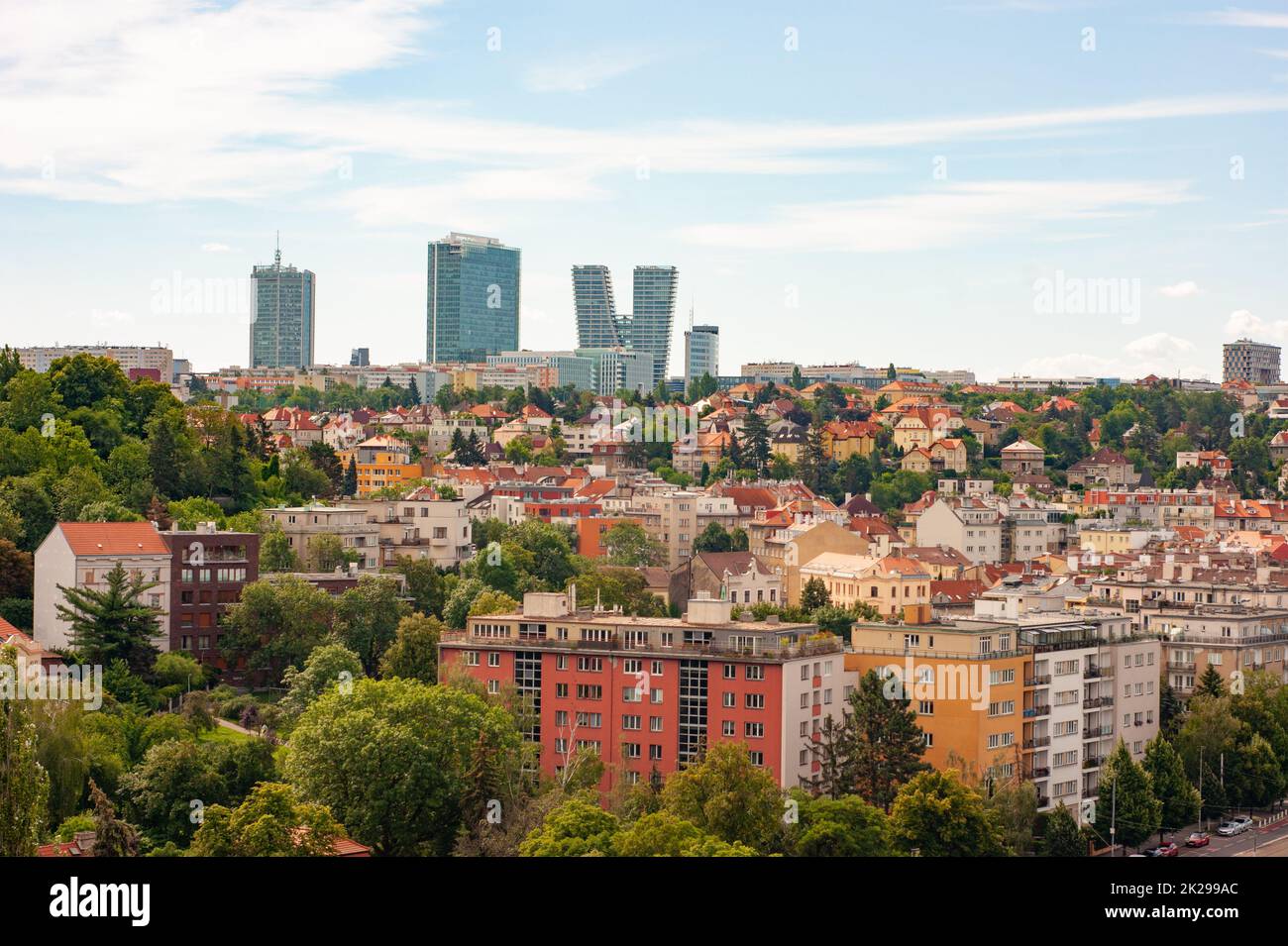 Modern day business skyline in Prague, Czech Republic. See red roofs ...