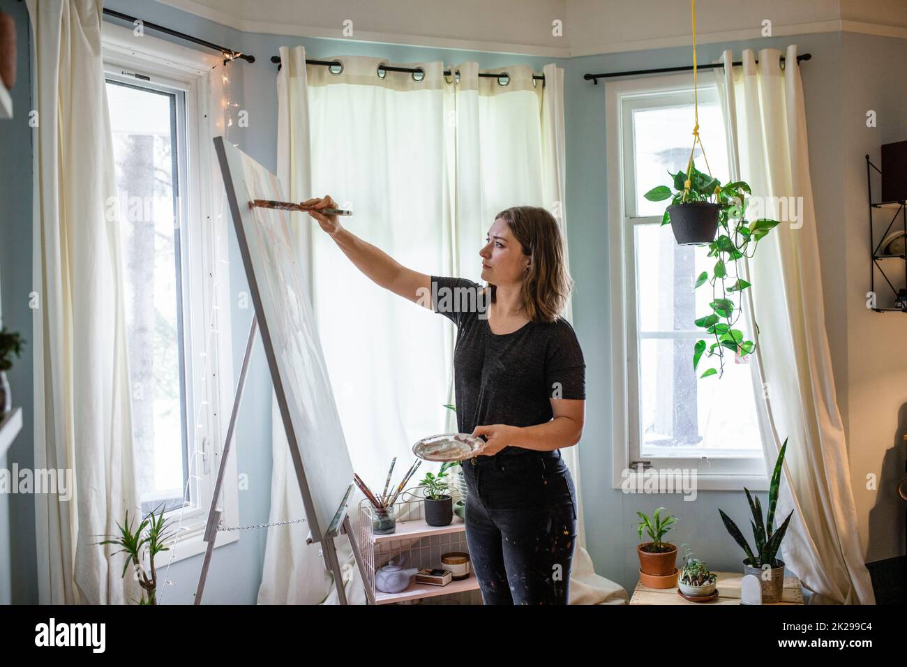 Working on painting hi-res stock photography and images - Alamy
