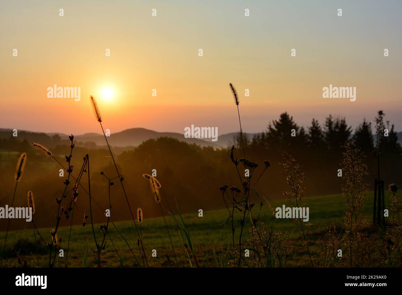 Rising sun in background hi-res stock photography and images - Alamy