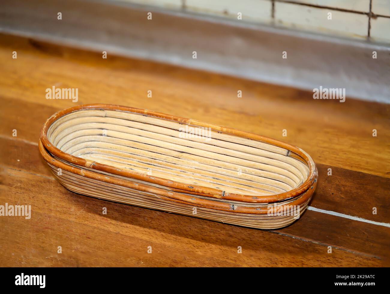 The basket for a loaf of bread to rest before baking Stock Photo - Alamy