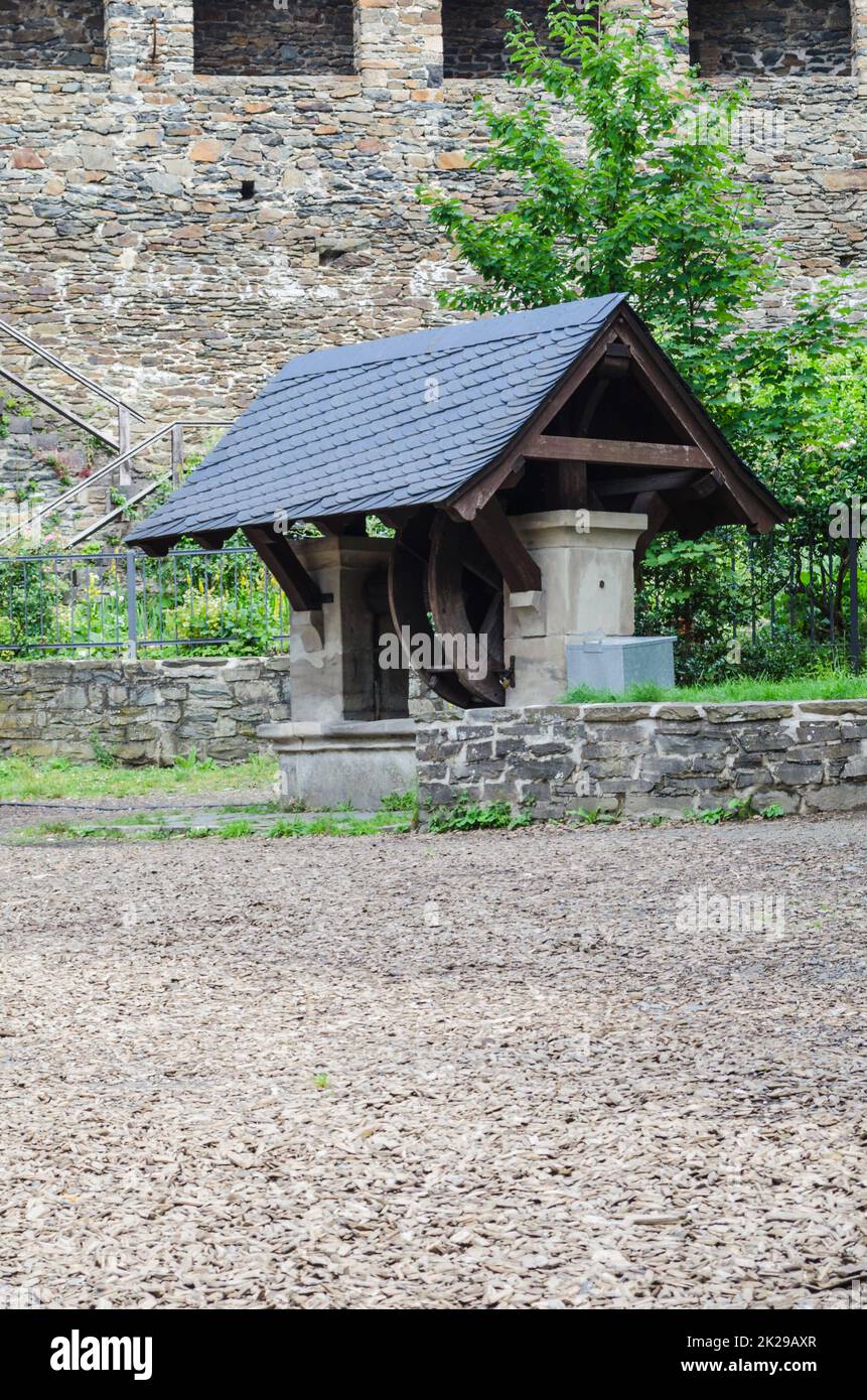 Ancient draw-well in European village Stock Photo - Alamy