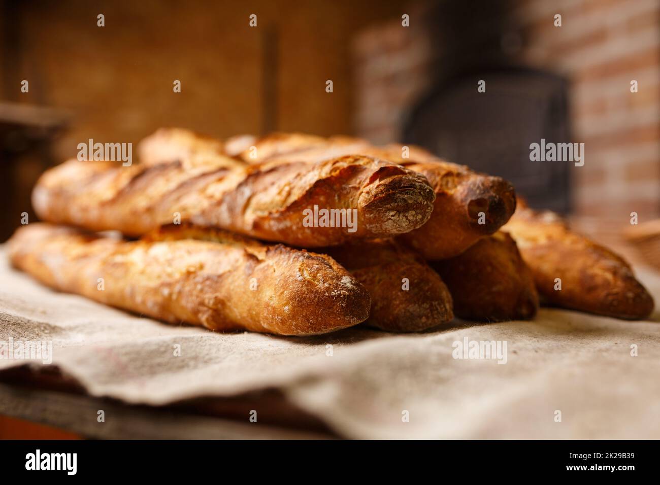 French organic baguettes in authentic bakery setting Stock Photo - Alamy
