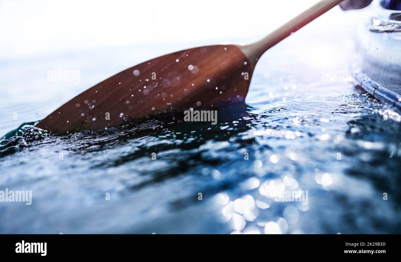 Oars splashing in fresh water paddle Stock Photo - Alamy