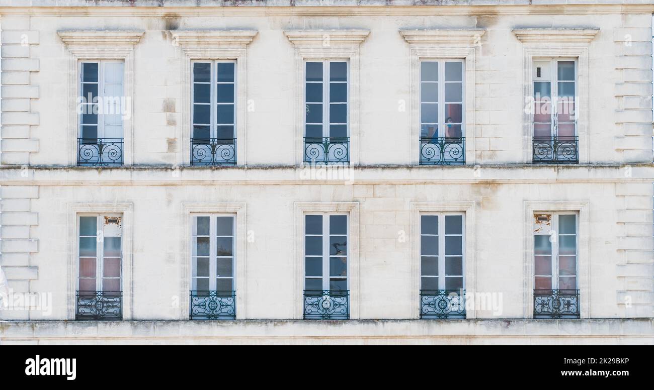 Architectural building with windows and railings Stock Photo - Alamy