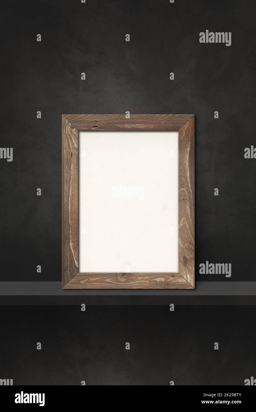 Wooden picture frame leaning on a black shelf. 3d illustration ...