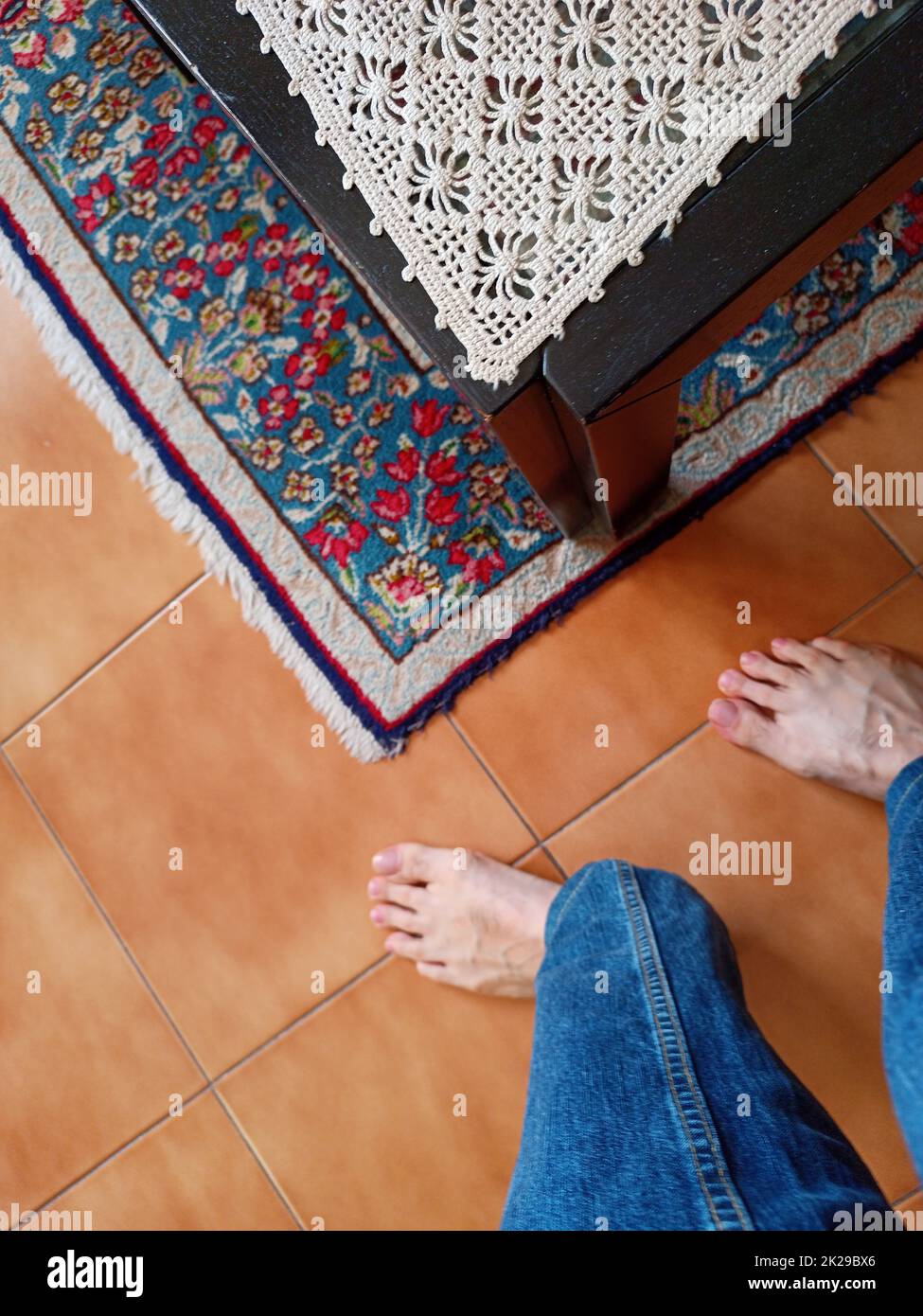 Man barefoot feet table hi-res stock photography and images - Alamy