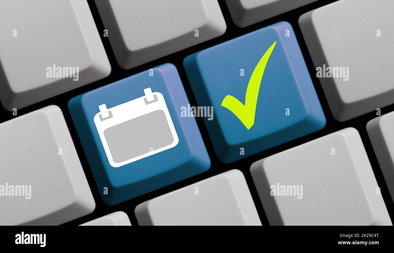 Calendar and checkmark icon on computer keyboard Stock Photo - Alamy