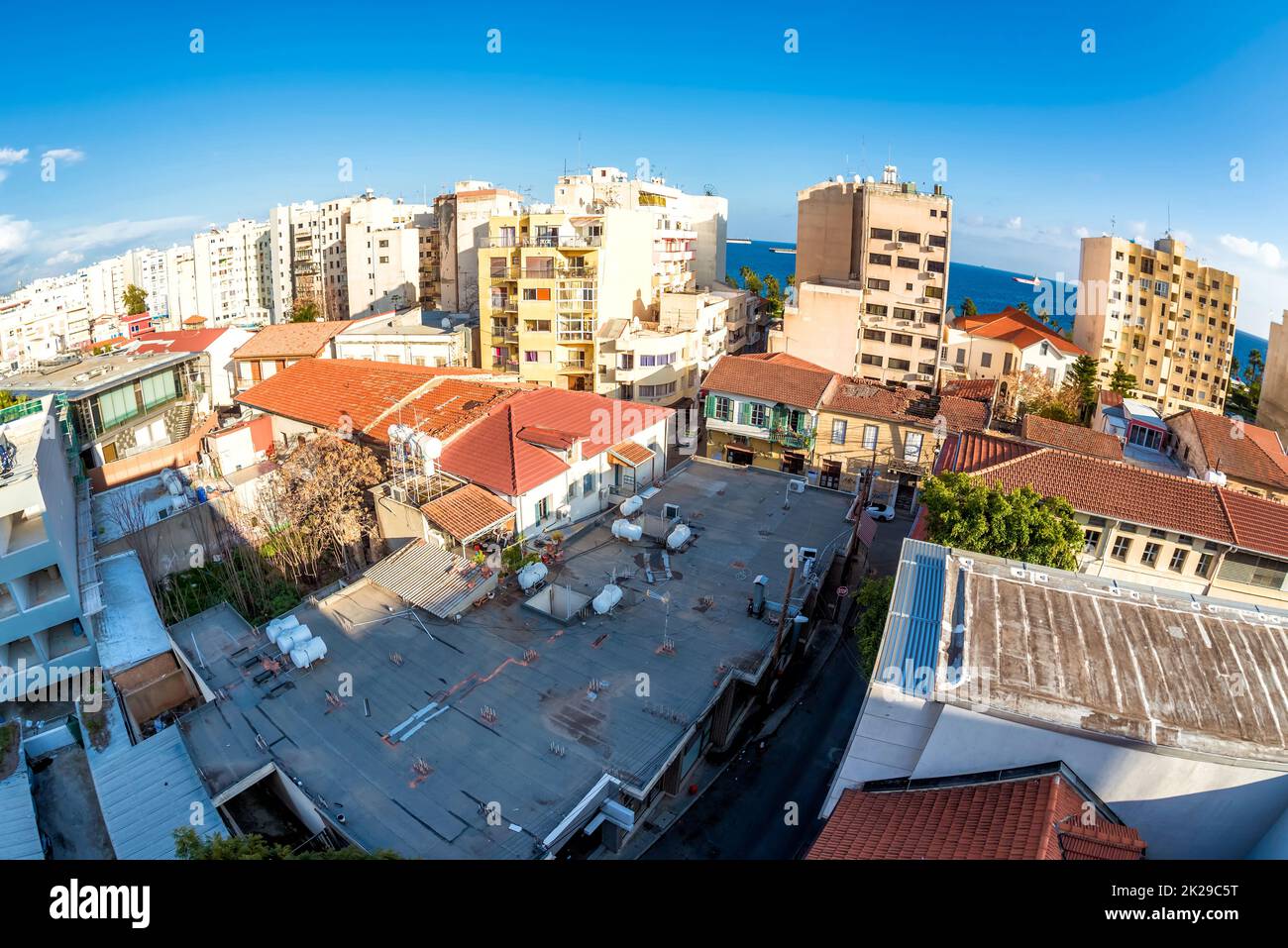 Residential buildings above the roofs of Old Town. Limassol, Cyprus ...