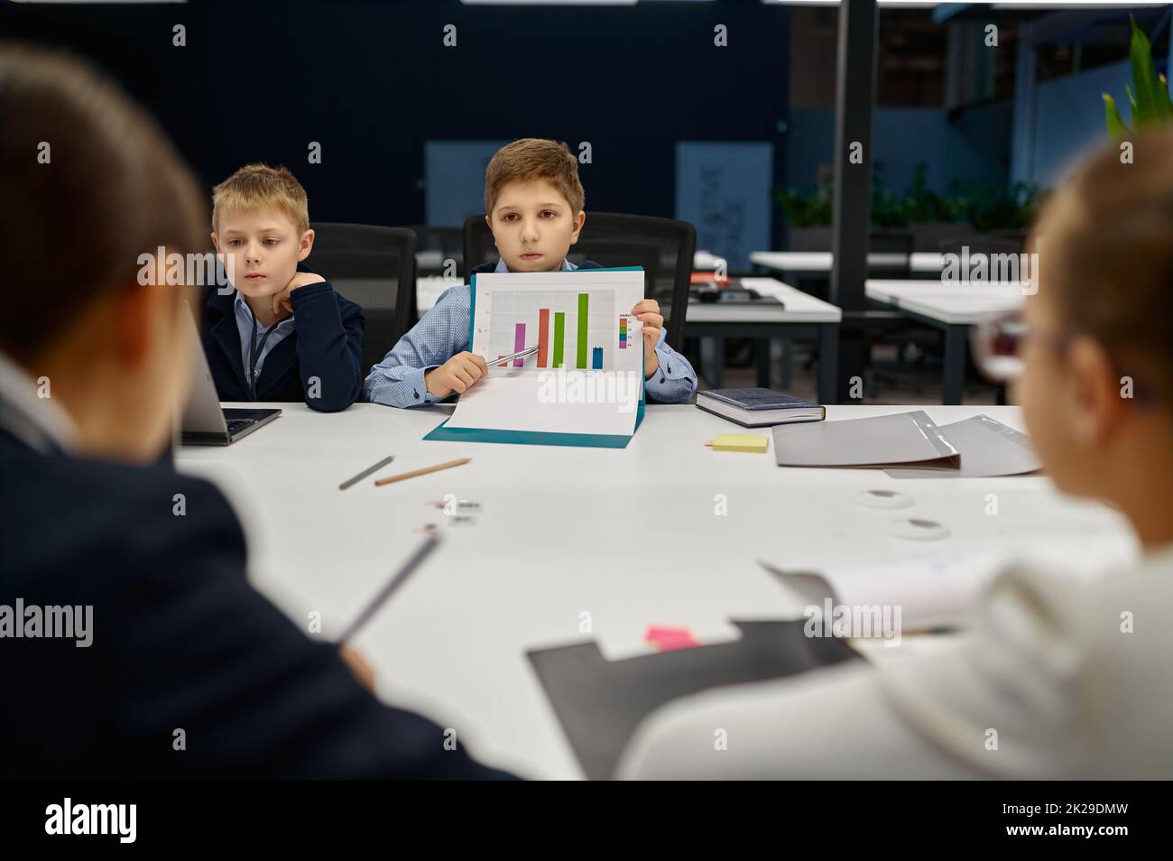 Child worker present analytics and income forecast Stock Photo - Alamy