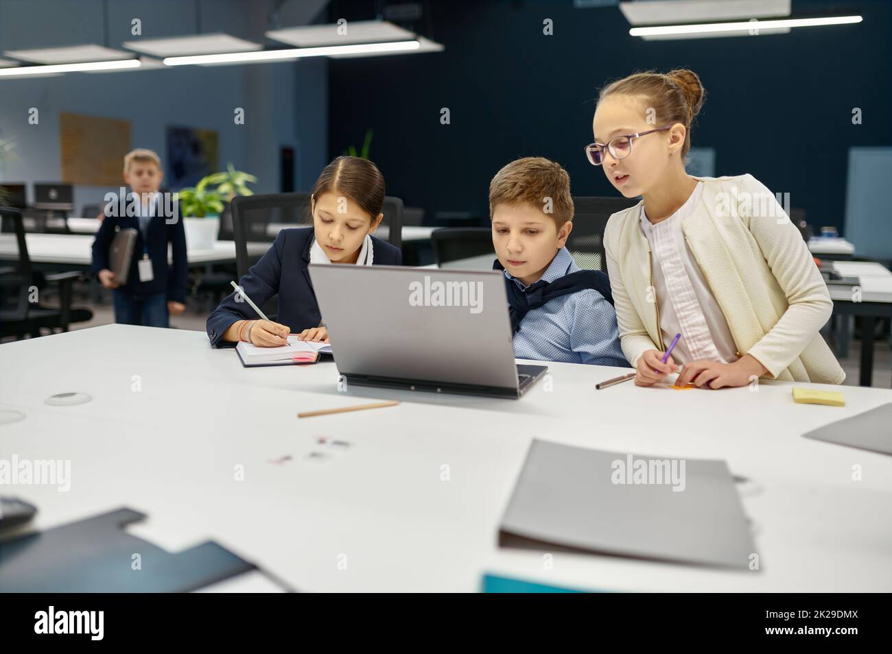 Digital native students e-learning over laptop computer Stock Photo - Alamy