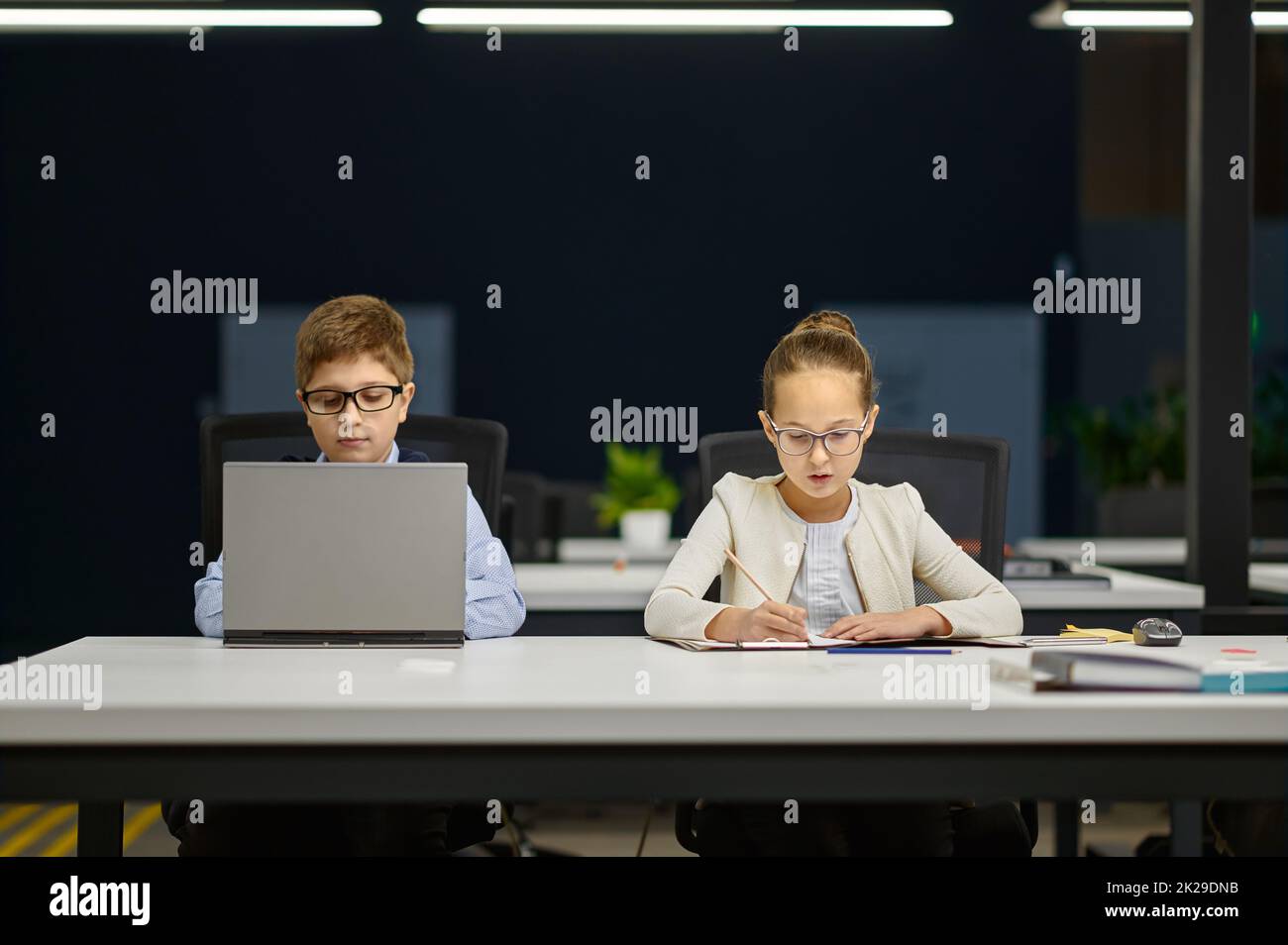 Portrait of smart children office business team Stock Photo - Alamy