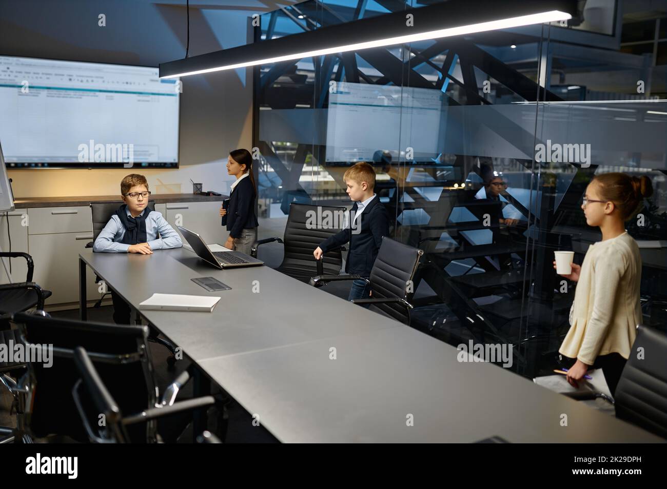 Children business team discussion at group briefing Stock Photo - Alamy