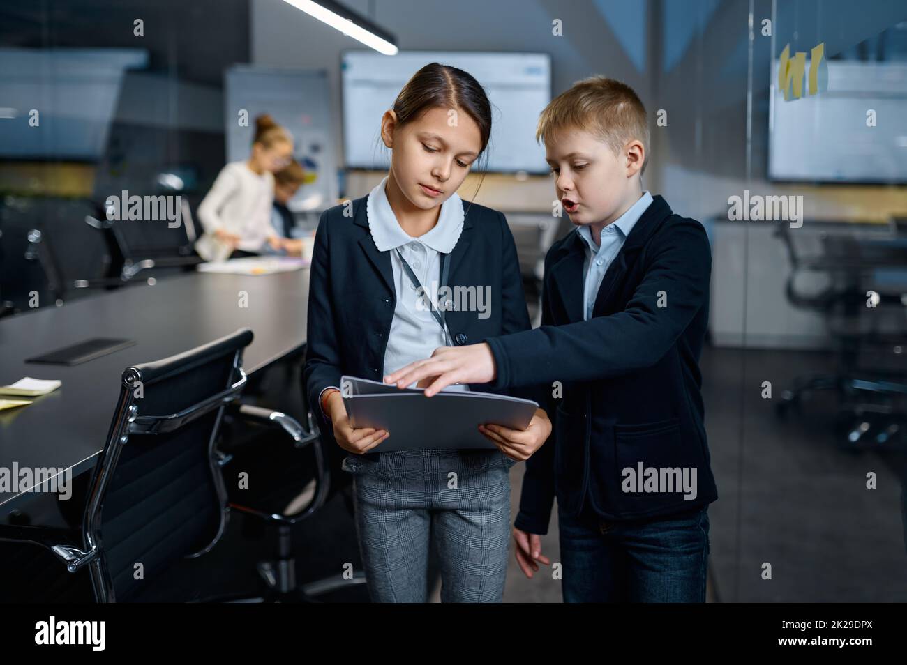 Employee colleague children preparing paperwork for meeting Stock Photo ...