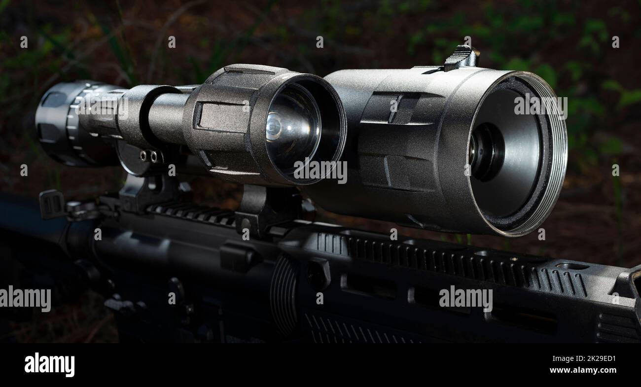 Infrared night vision scope on a modern sporting rifle outdoors Stock ...