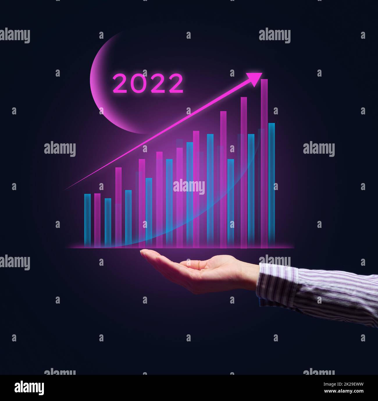 Holographic graph with growing indicators and a businessman's hand. The ...