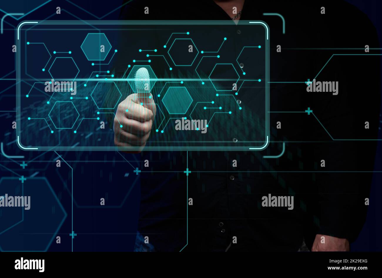 a man stands in front of a virtual screen with a security system and fingerprint identification ...