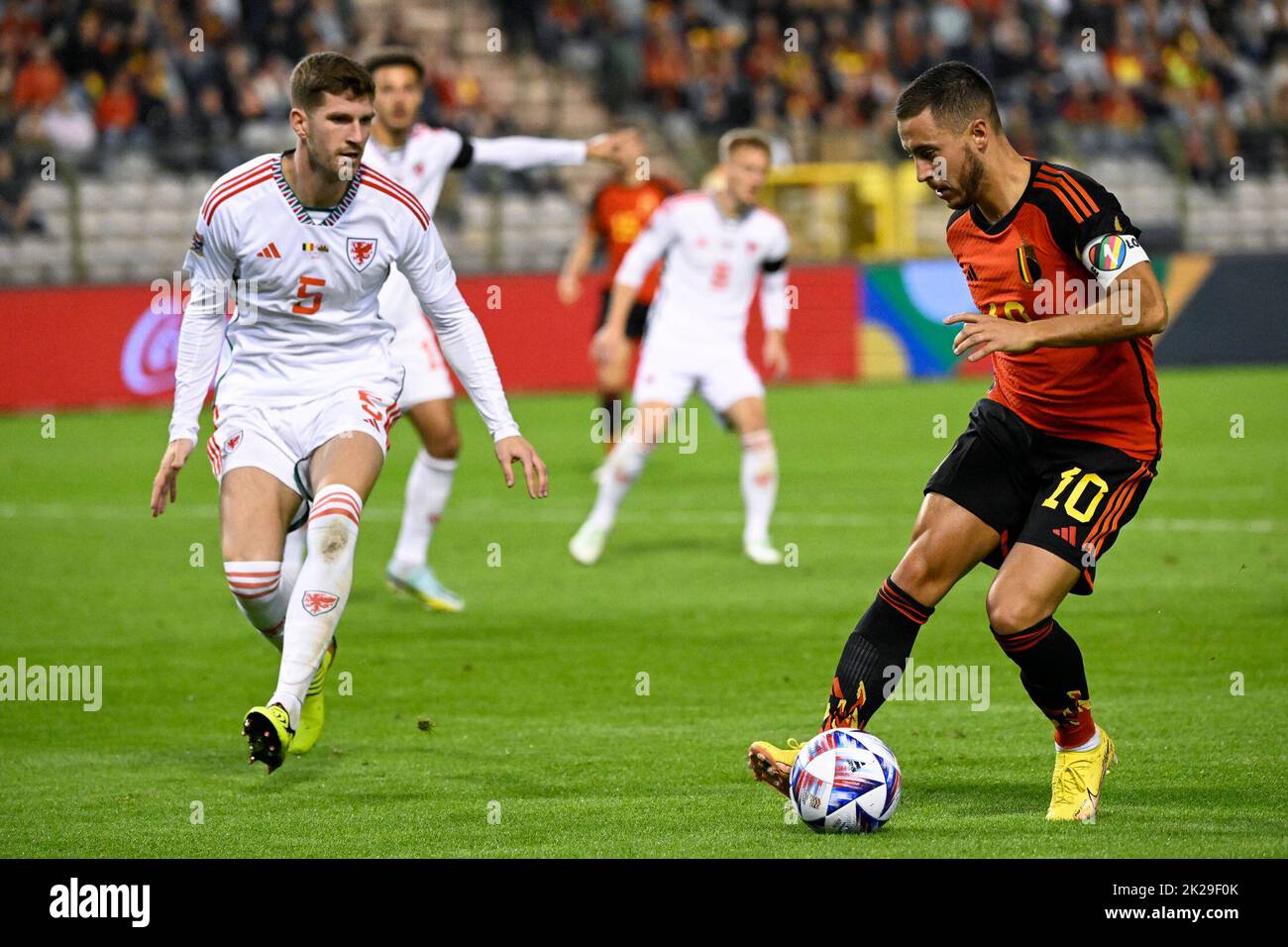 Brussels, Belgium, 22 September 2022, Welsh Chris Mepham and Belgium's ...