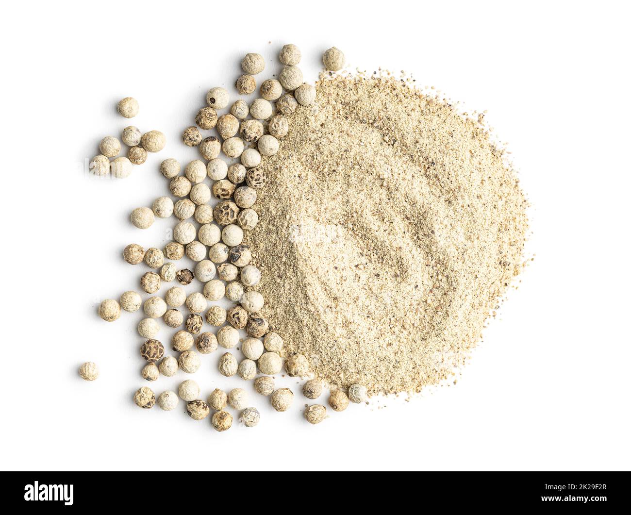 White ground pepper and whole peppercorn spice isolated on white ...
