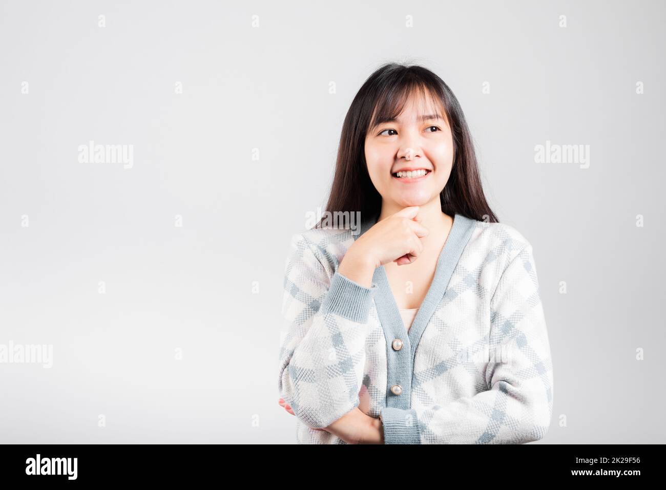 Happy woman hand touch chin handle relaxed thinking about something ...