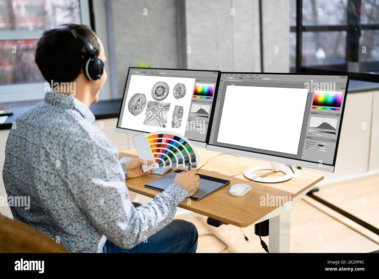 Young male graphic designer editing hi-res stock photography and images ...