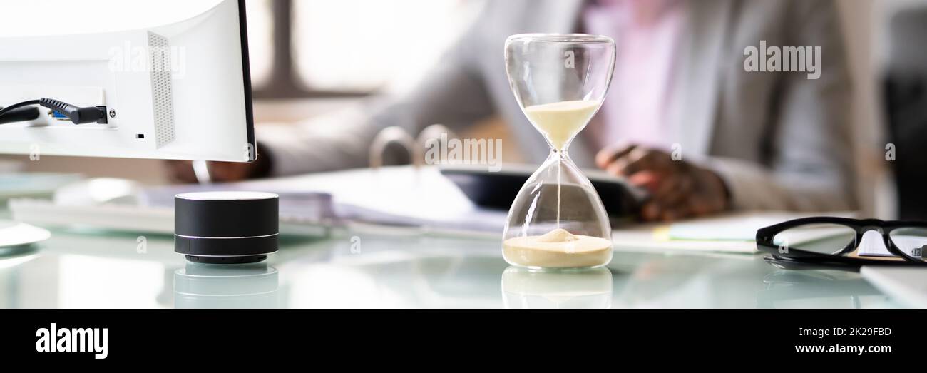 Accountant Calculating Invoice Bill In Time Stock Photo - Alamy