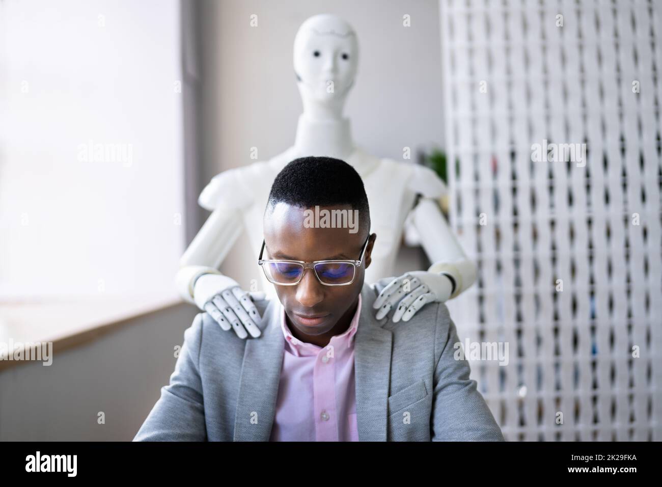 Physiotherapist AI Robot Doing Shoulders Massage Stock Photo - Alamy