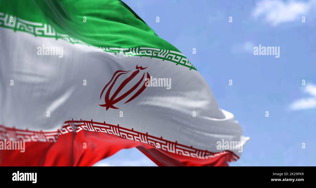 Iran flag waving on green hi-res stock photography and images - Alamy