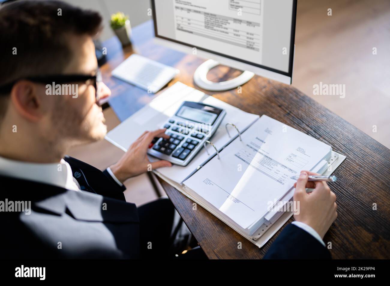 Young professional male accountant hi-res stock photography and images ...