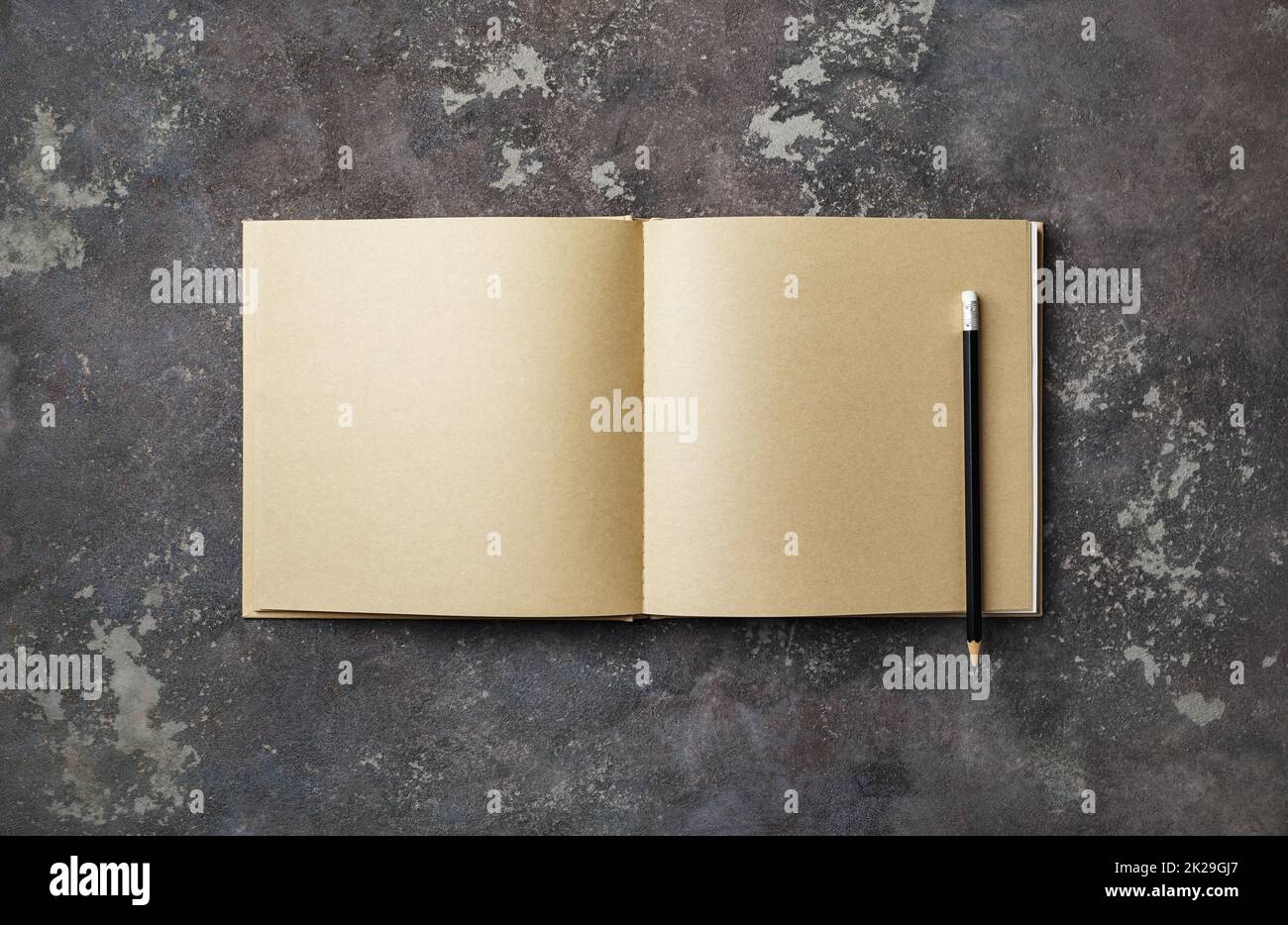 Kraft book, pencil Stock Photo - Alamy