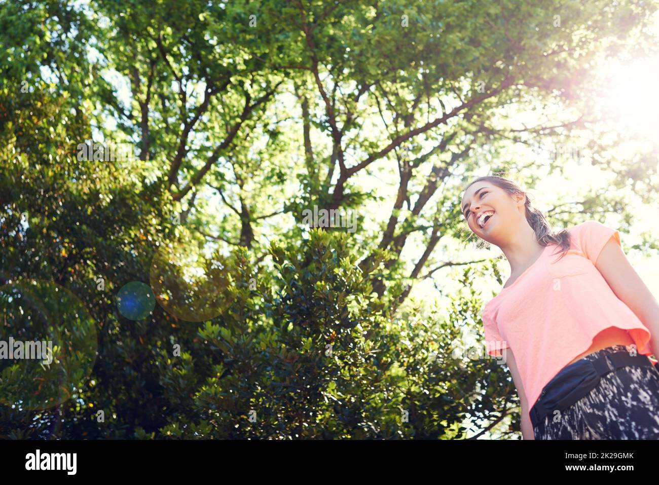 Working out is her mood changer. a sporty young woman walking beside ...