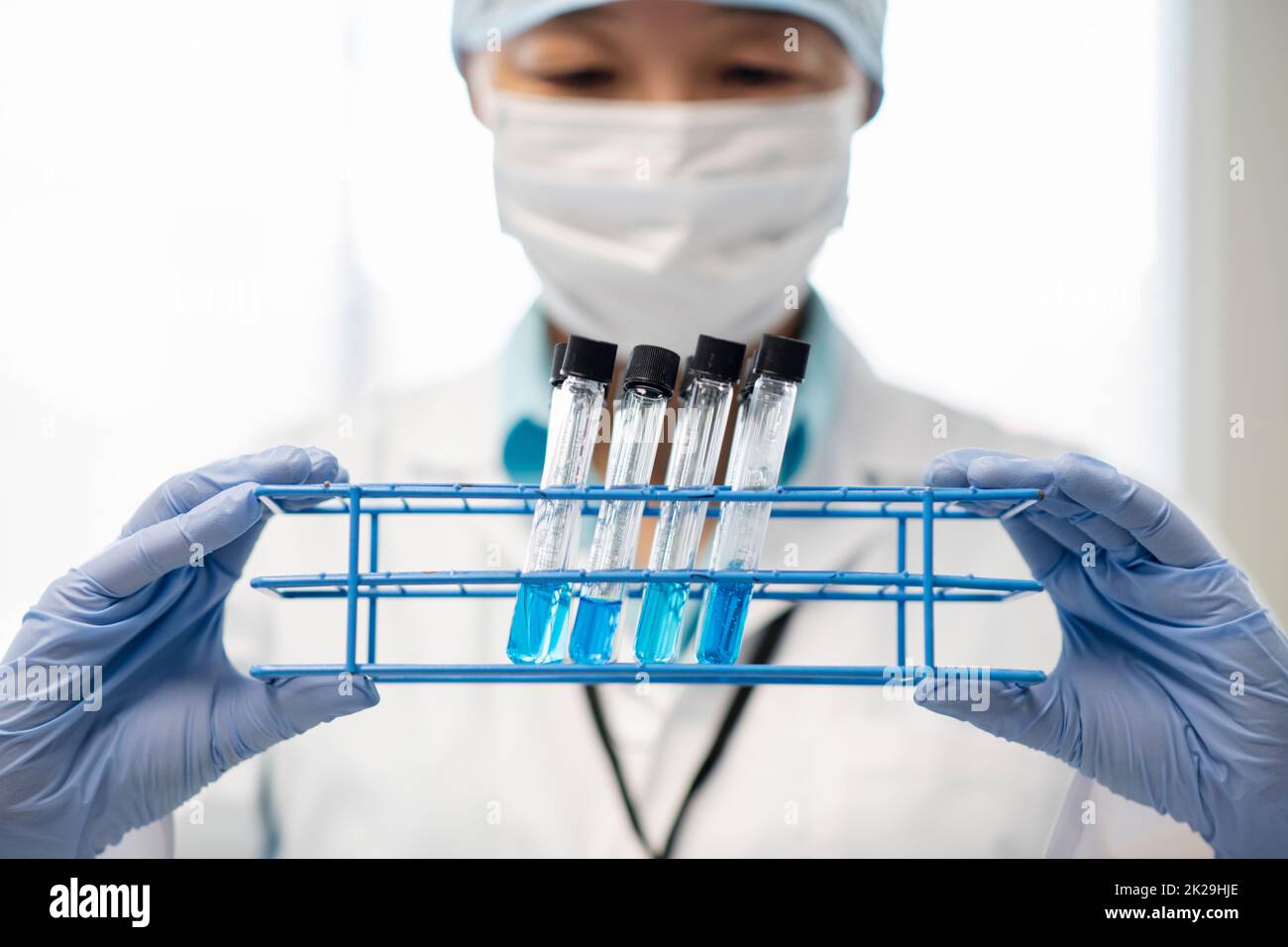 Scientist holding test tube rack hi-res stock photography and images ...