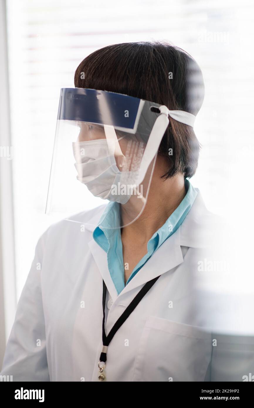 Wearing safety gloves hi-res stock photography and images - Alamy