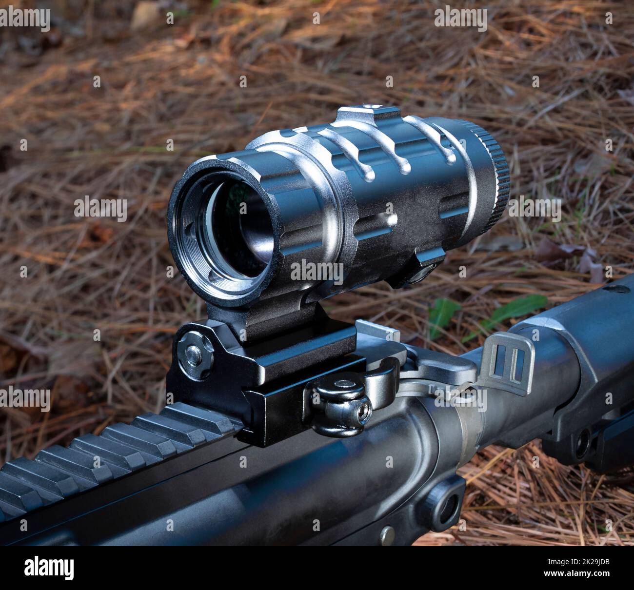 Magnifier sight mounted on an AR-15 that is outdoors Stock Photo - Alamy