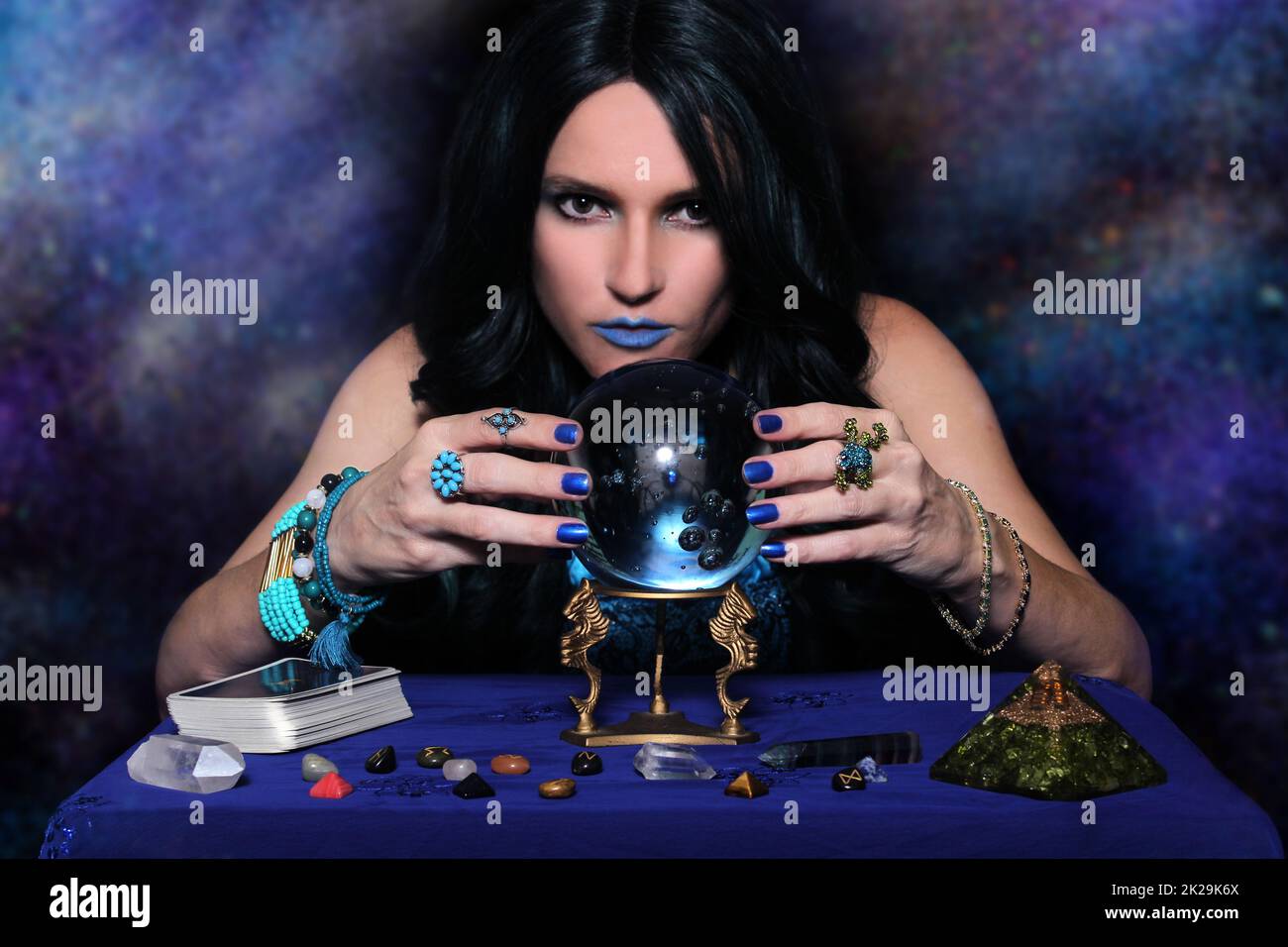 Psychic with crystal ball and tarot cards, Shallow DOF Stock Photo - Alamy
