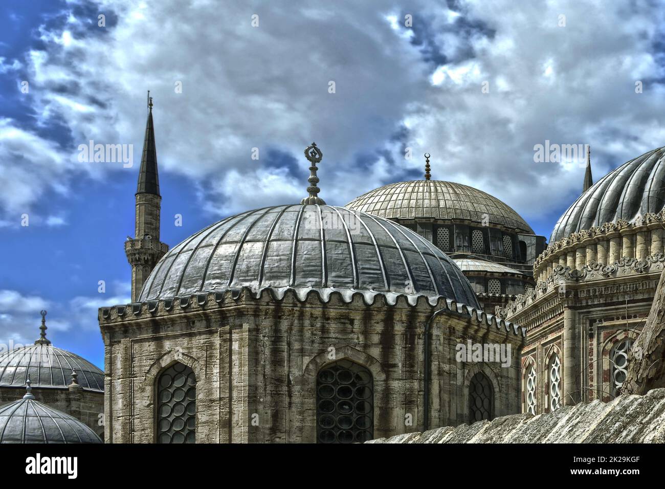 Istanbul mosque roof top hexagonal blue sky with clouds Stock Photo - Alamy