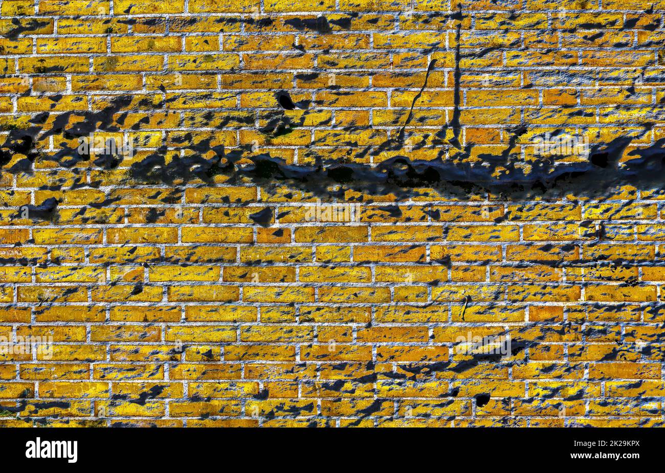 Detailed close up view on very old and weathered brick walls with ...