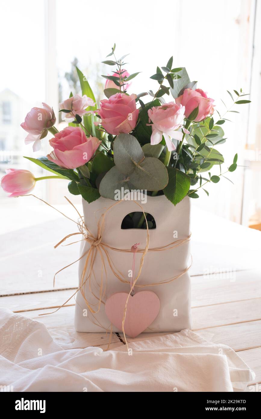 Beautiful pink colored bouquet spring flowers Stock Photo - Alamy