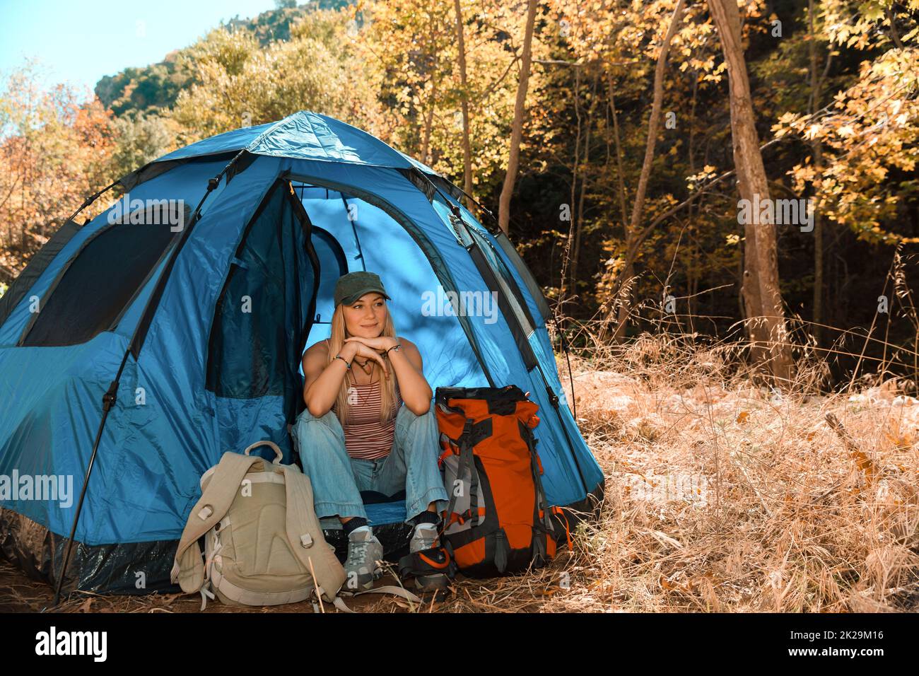 Woman enjoying camping in hi-res stock photography and images - Alamy