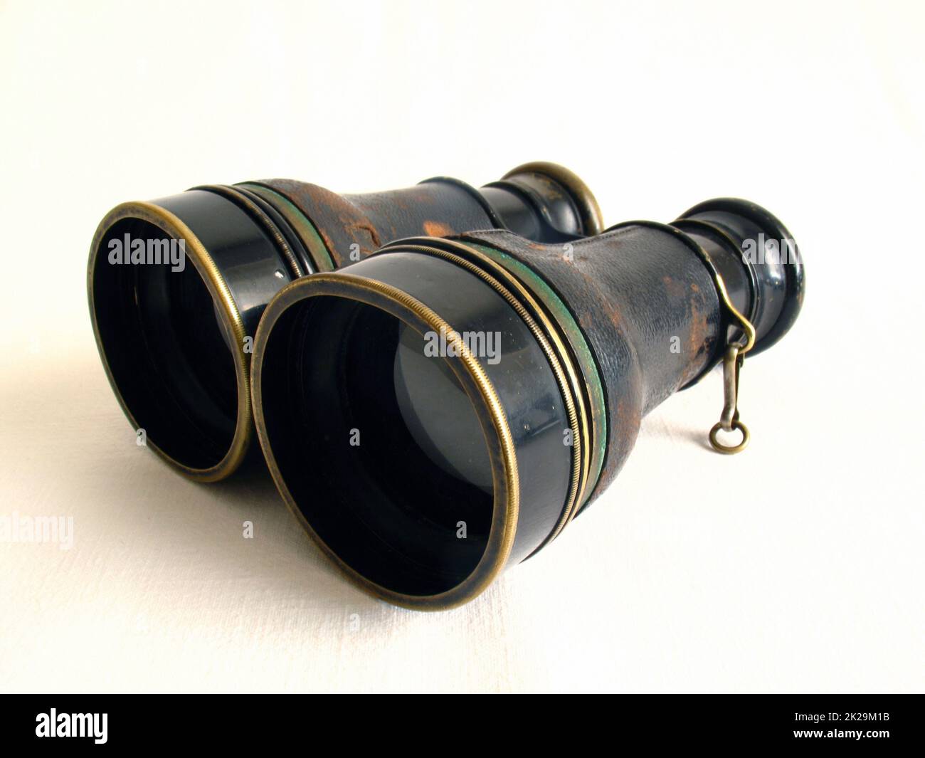 Studio shot of an old pair of leather-covered binoculars Stock Photo ...