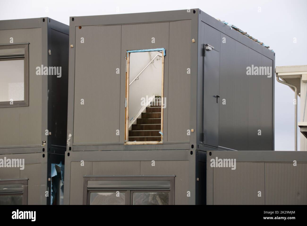 Old containers for living are stored in a storage yard Stock Photo - Alamy